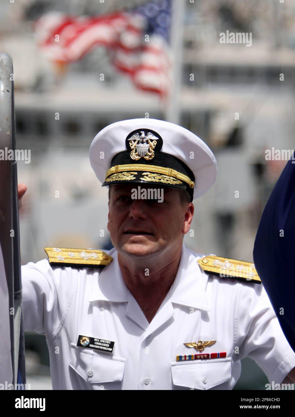 U.S. Vice Adm. William Gortney boards the USS Anzio in the Bahraini ...