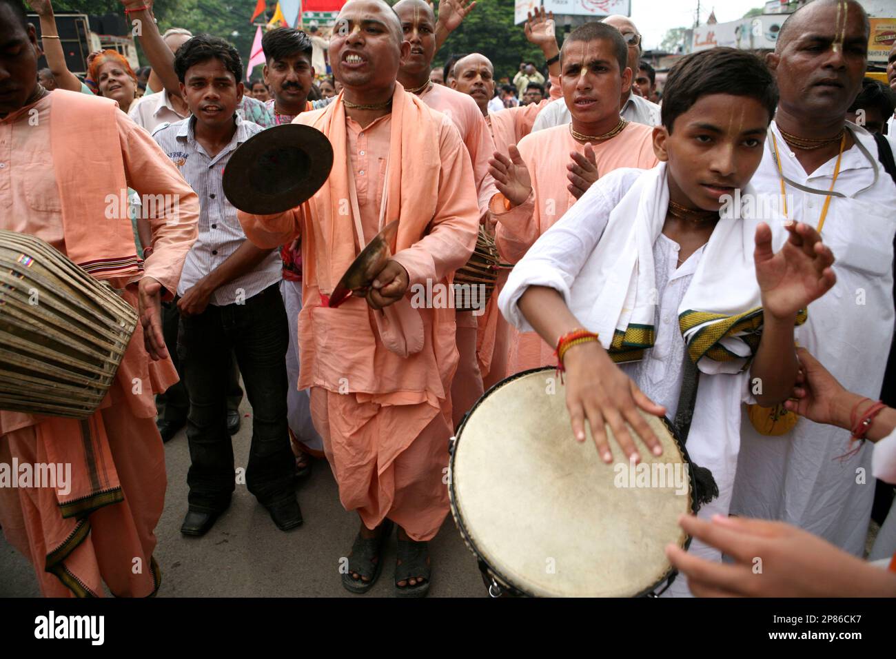 Devotees of Hindu God Krishna participate in a procession held ahead of ...