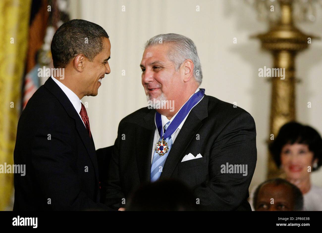 President Barack Obama, left, talks with Pedro Jose Greer Jr., the ...