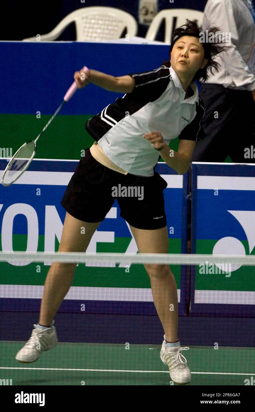 Hong Kong's Zhou Mi competes against New Zealand's Michelie Chan ...