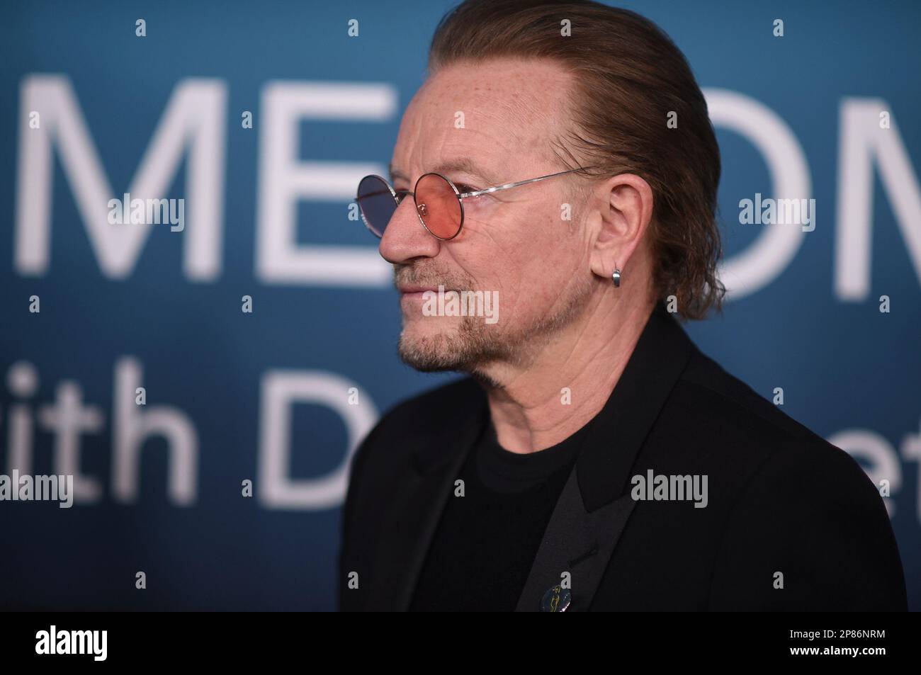 Bono arrives at the premiere of "Bono & The Edge: A Sort of Homecoming ...