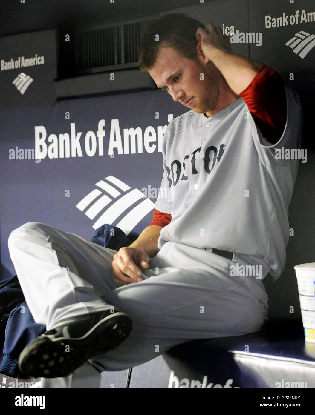 Boston Red Sox pitcher Daniel Bard sits on the bench after being ...
