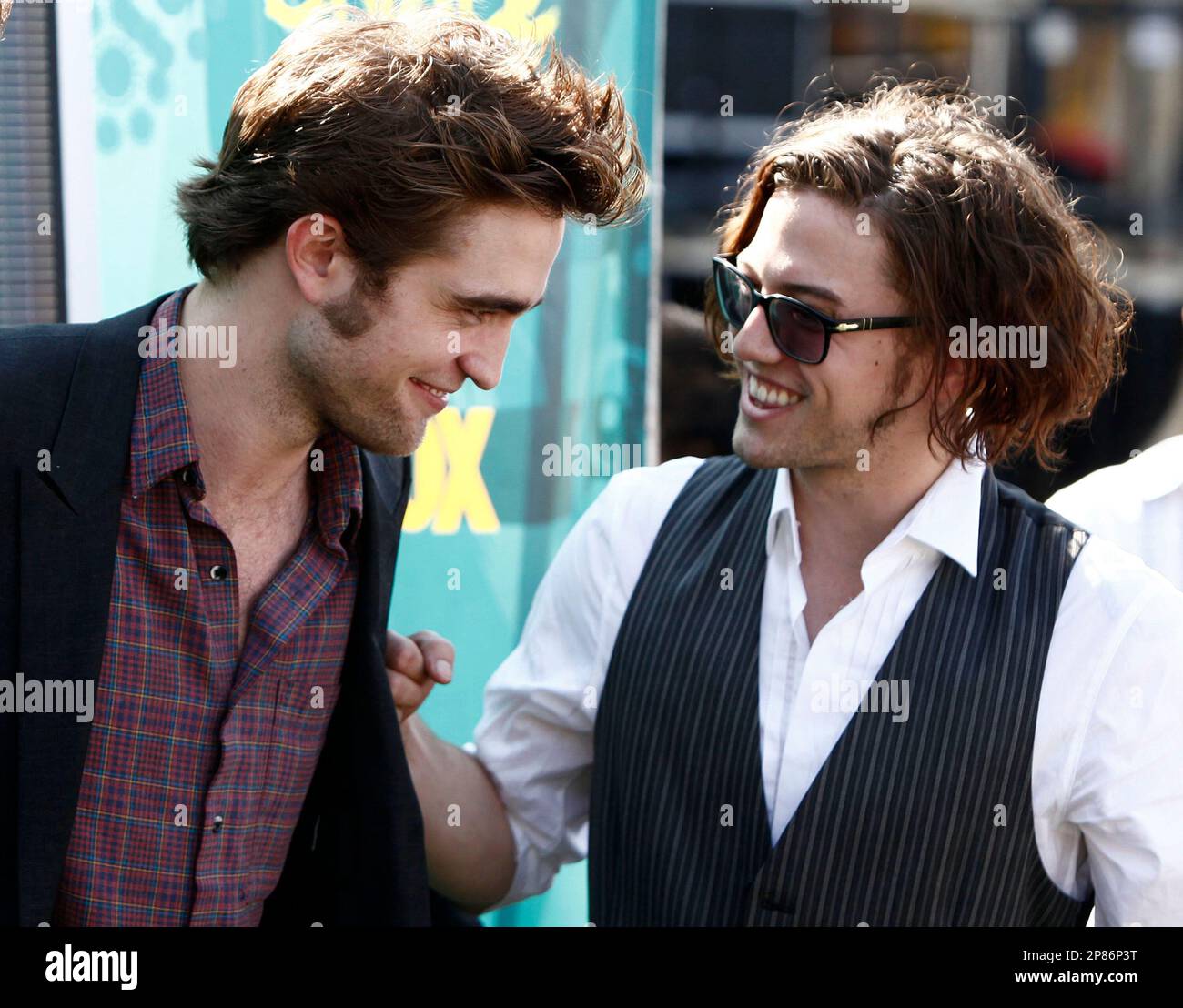 Jackson Rathbone And Robert Pattinson