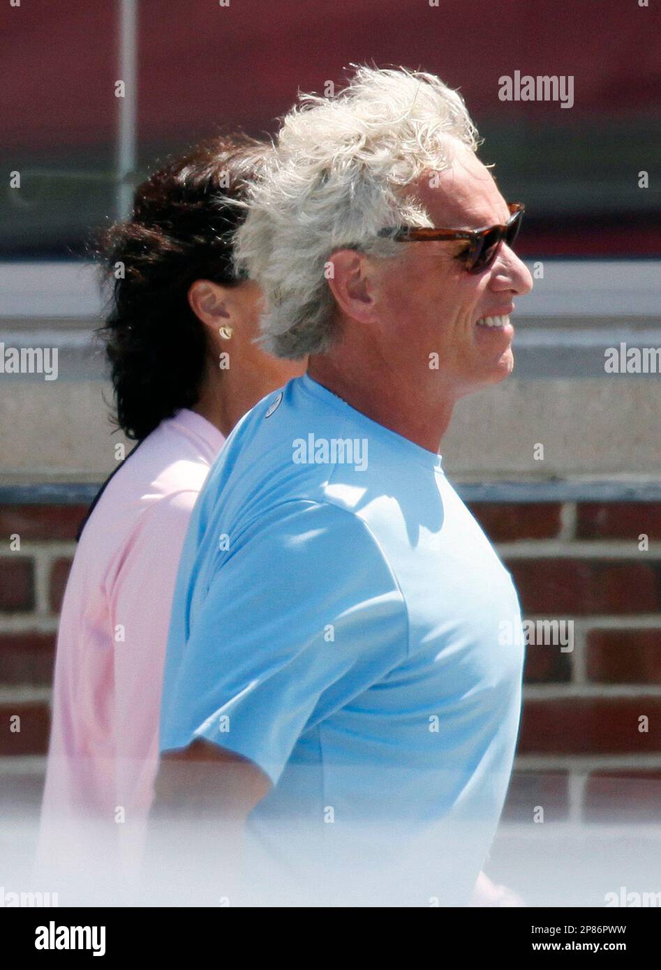 Joe Kennedy arrives with his wife Beth, behind, at Cape Cod Hospital in ...