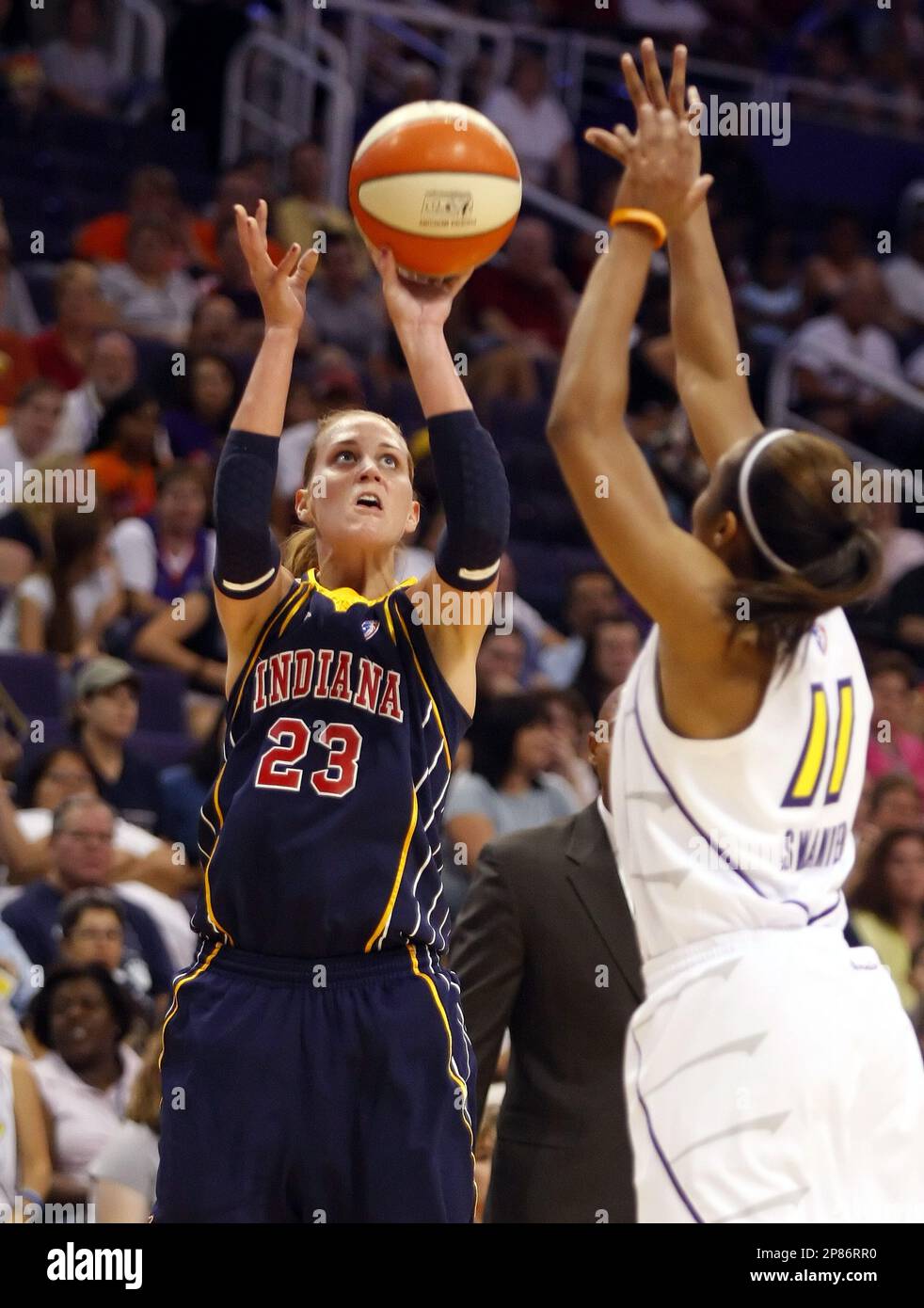 Indiana Fevers' Katie Douglas, left, shoots against Phoenix Mercurys ...