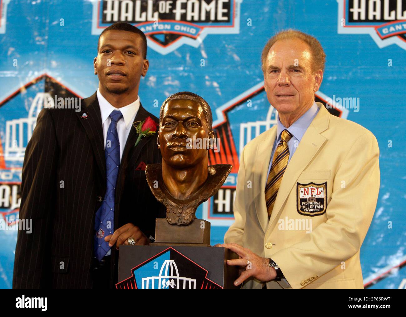 Bob Hayes Jr., left, and presenter, Hall of Fame quarterback of the ...