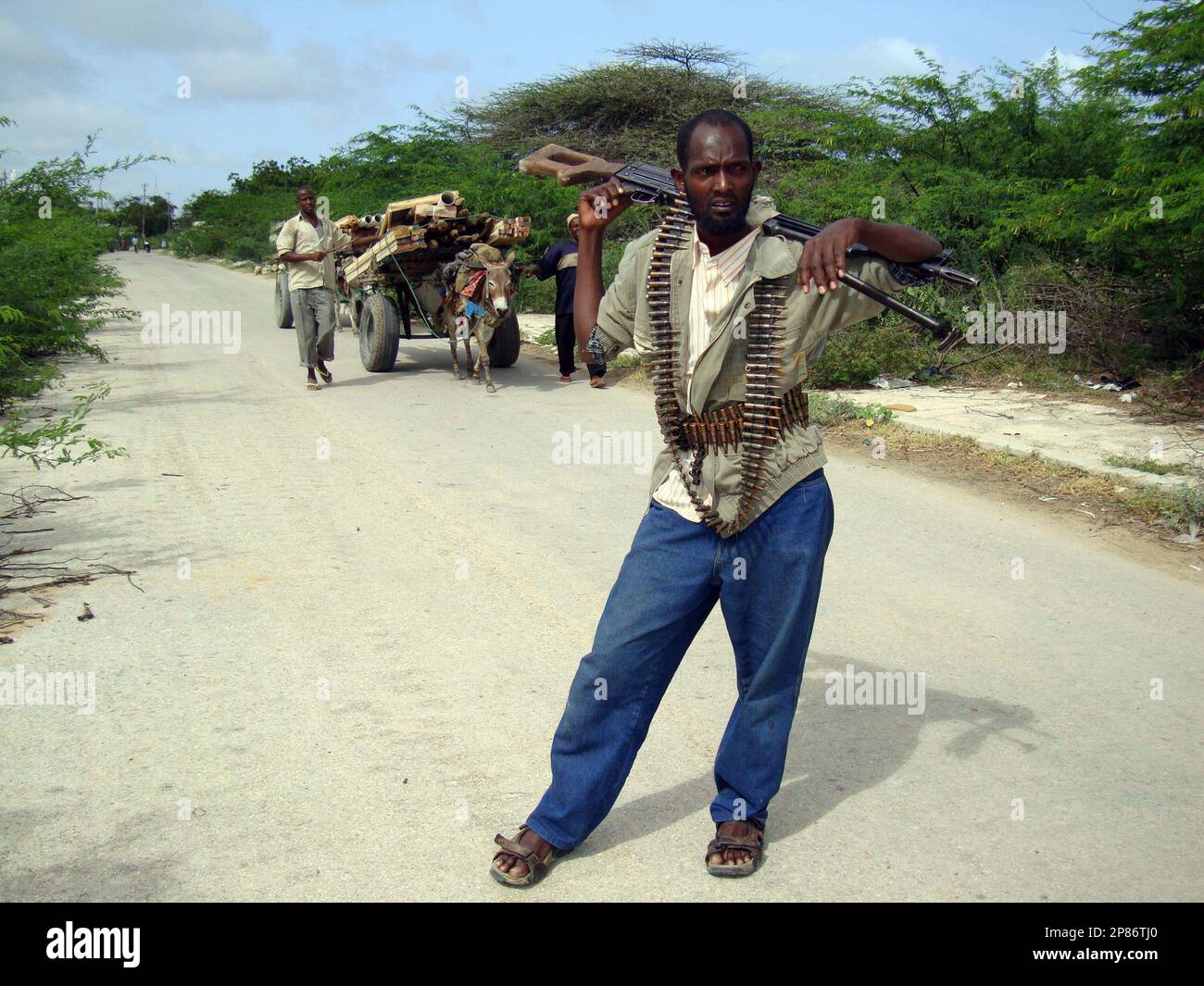 An insurgent from Islamic militia takes his position in the Terabunka ...