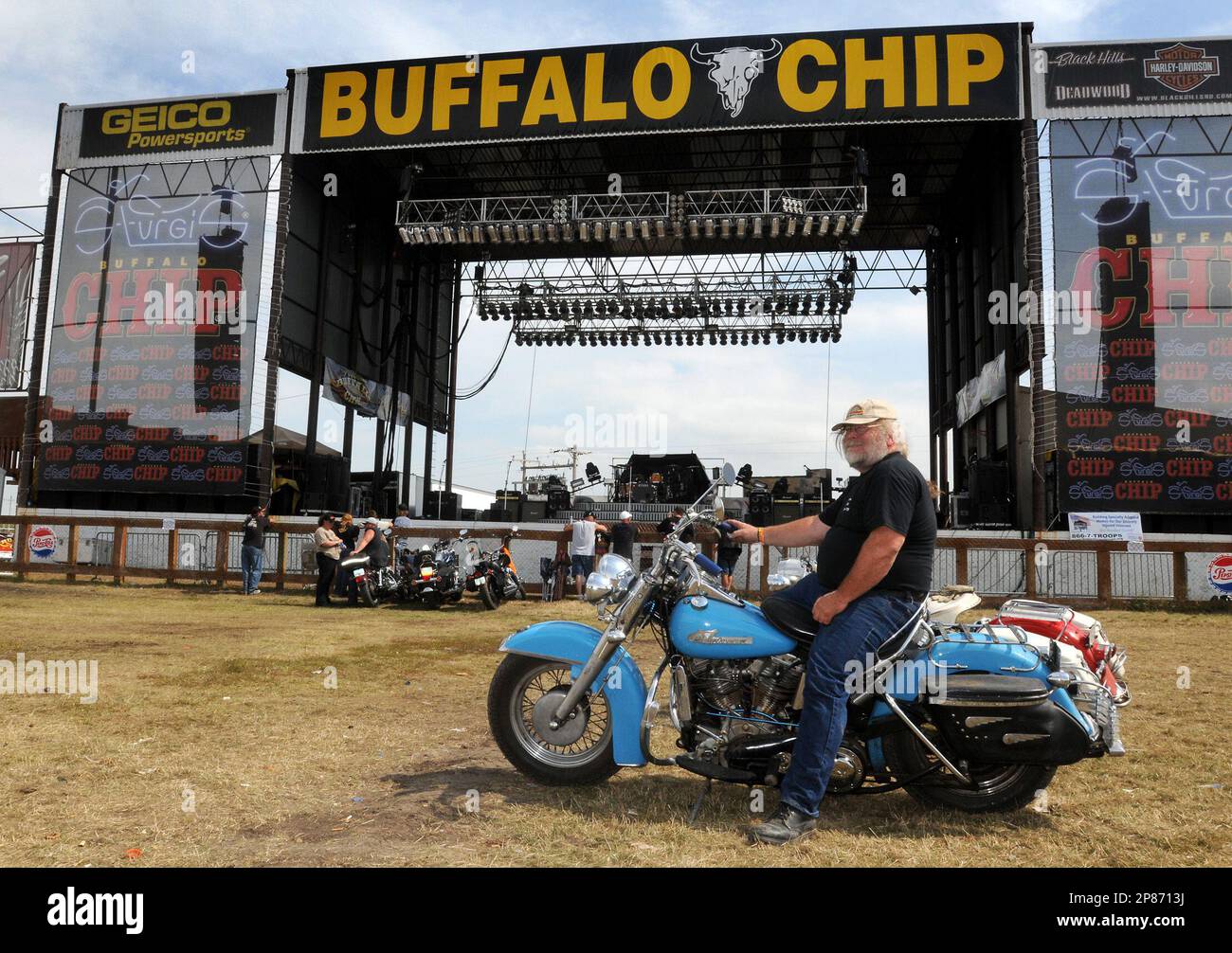 Allan Smith of Friend, Neb., listens to a sound check by the rock band ...
