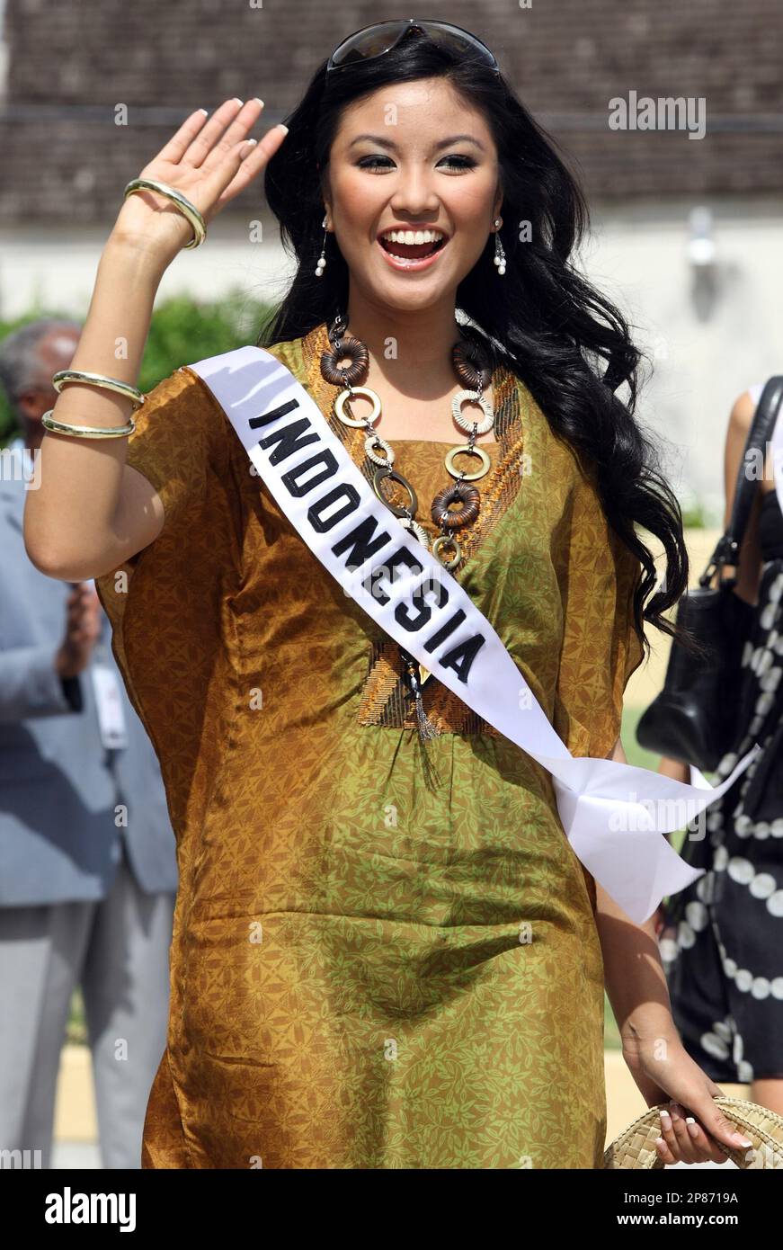 Zivanna Letisha Siregar, Miss Indonesia 2009, waves upon her arrival to ...