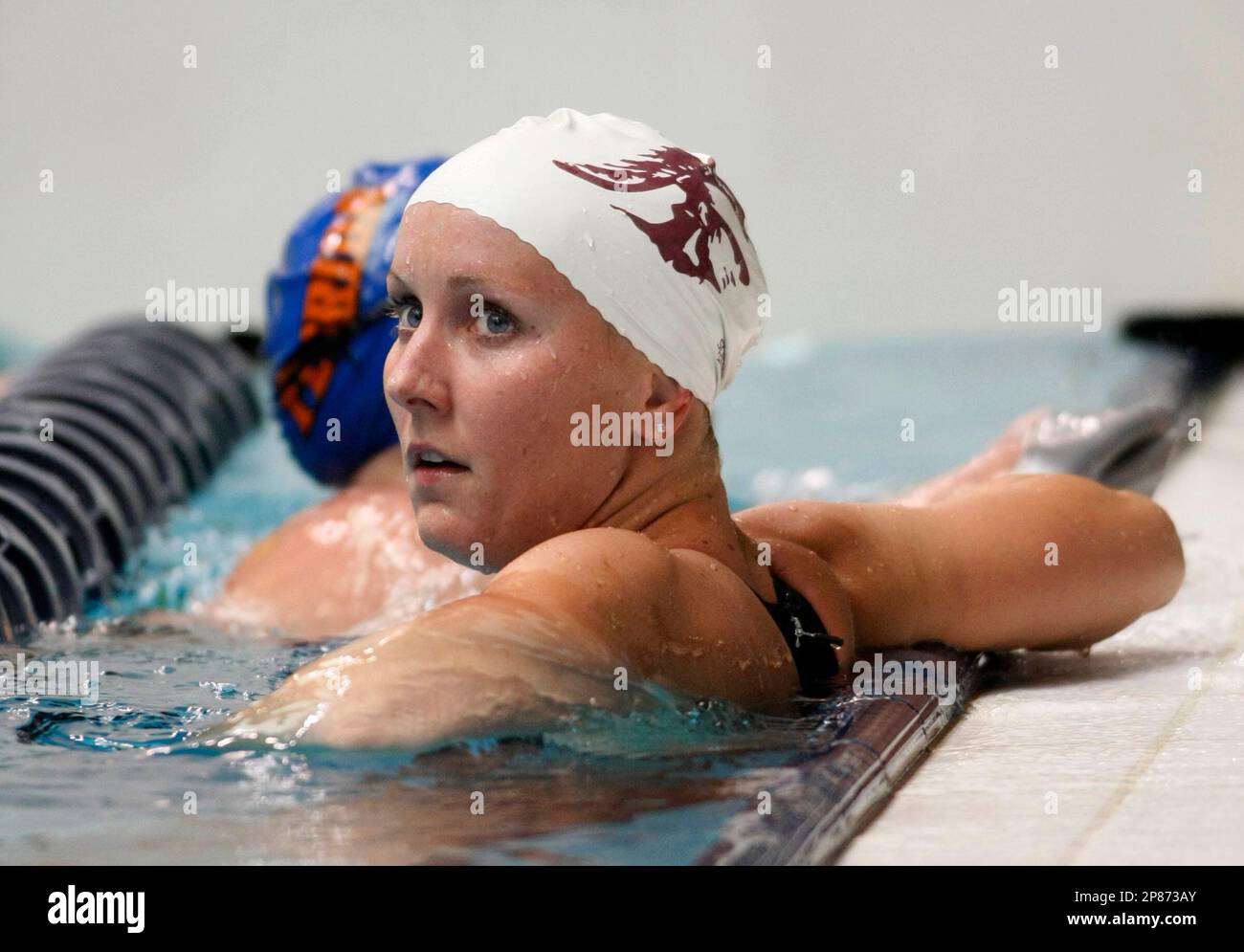 Jessica Hardy looks to the board for the results after she finished ...