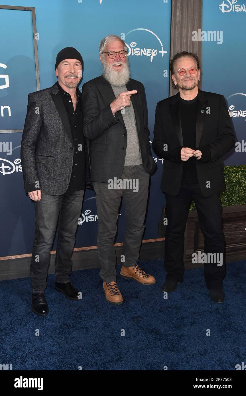 The Edge, from left, David Letterman and Bono arrive at the premiere of ...