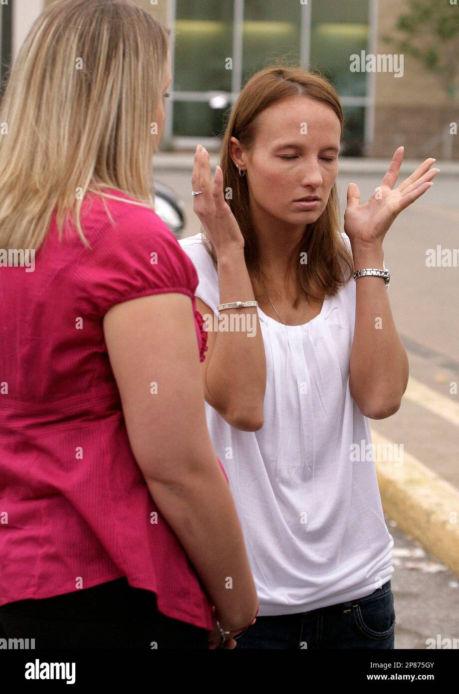 Stacey Falk, right, and Lisa Myl of Pittsburgh are interviewed outside ...