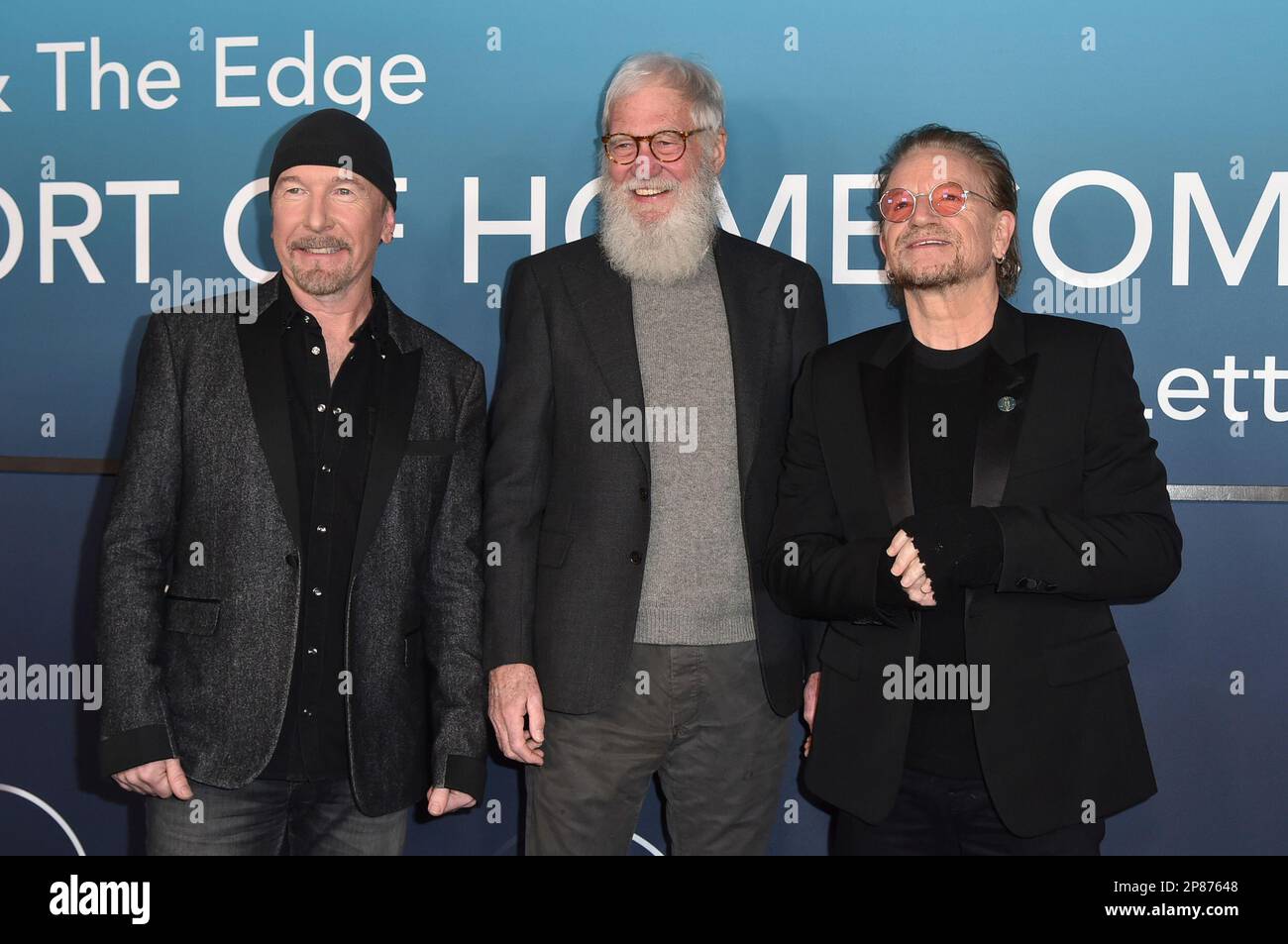The Edge, from left, David Letterman and Bono arrive at the premiere of ...