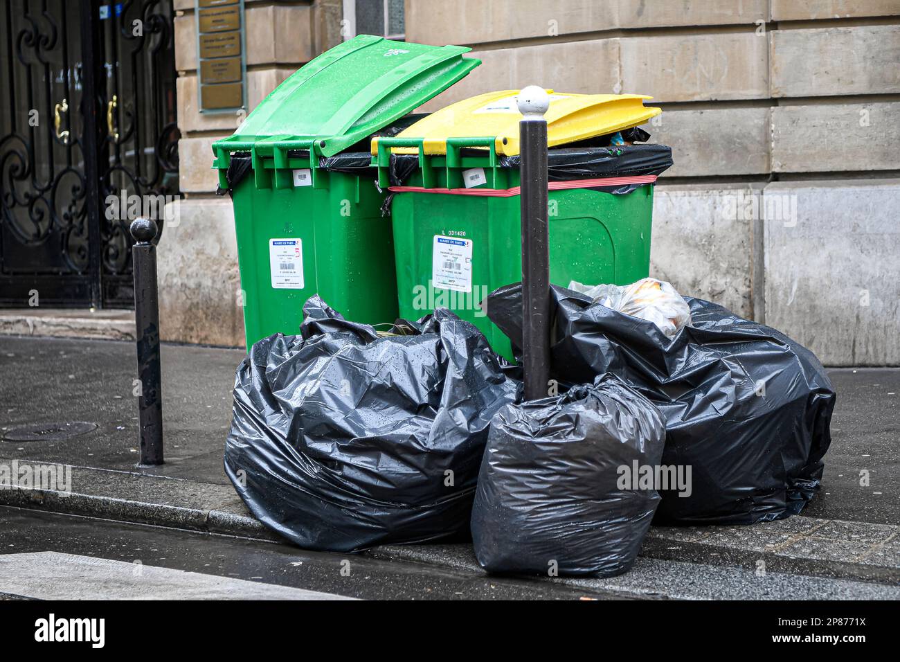 Illustration picture shows full bins on March 8, 2023 in Paris. A strike by waste collectors in ...