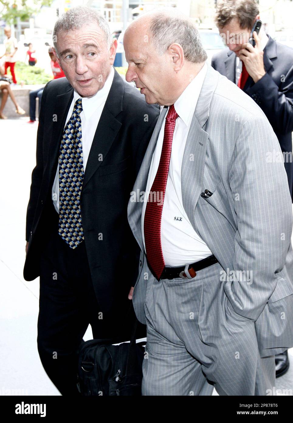 Attorneys Howard Weitzman, left, and Joel Katz, right, arrive at the ...