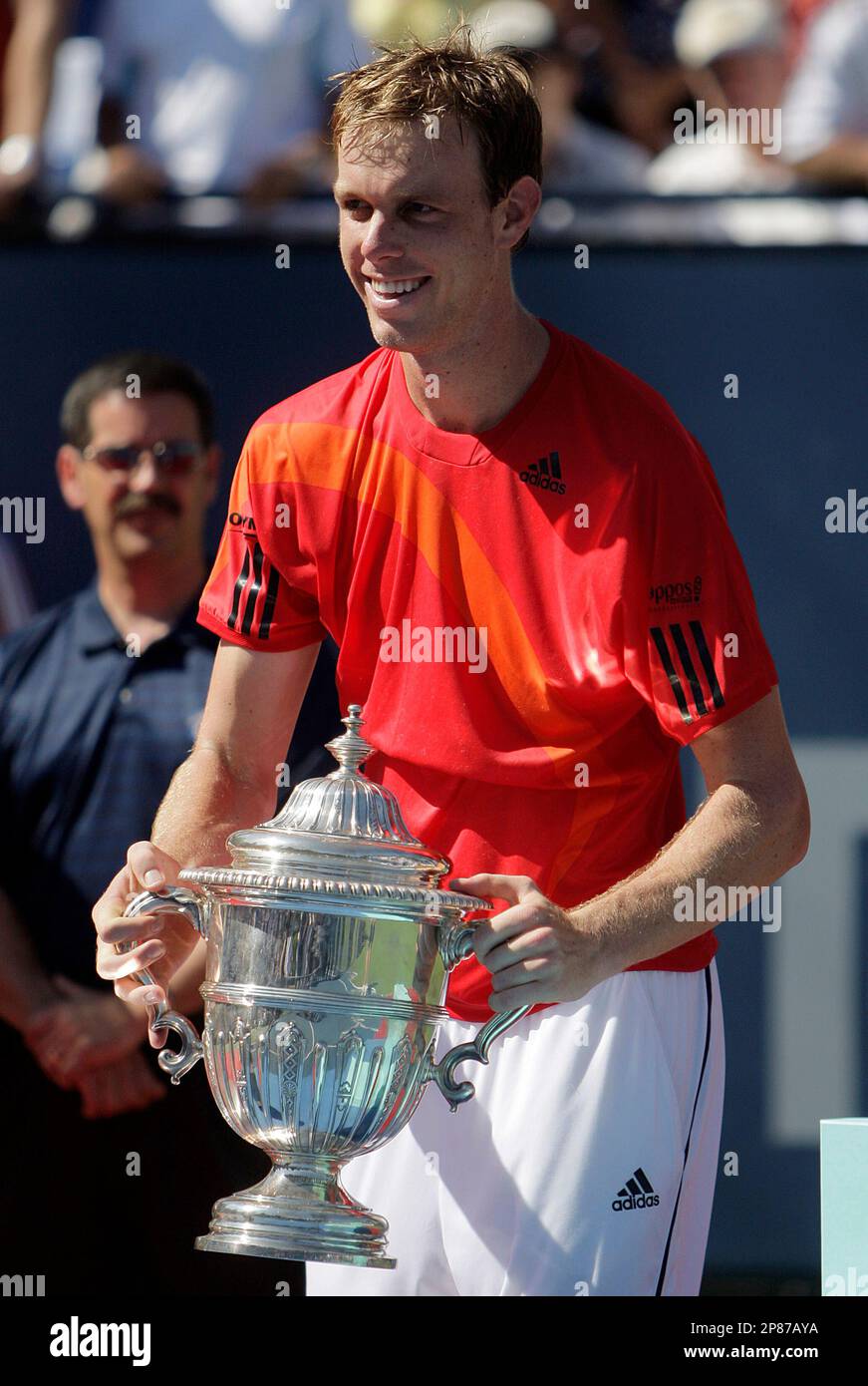 Sam Querrey, of the United States, poses with the trophy after he ...