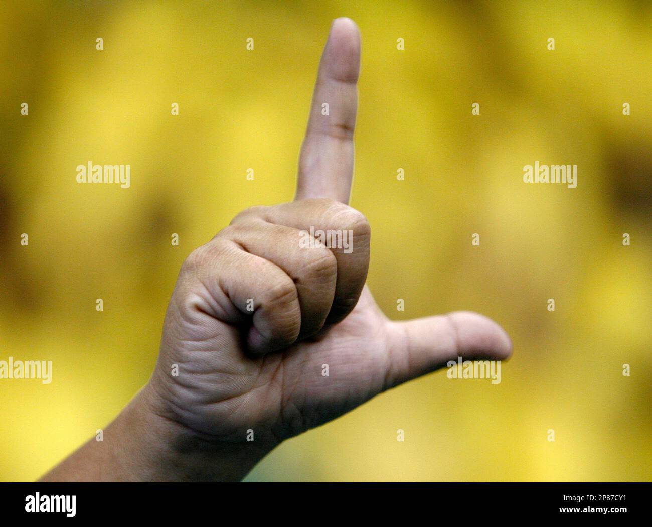 A Filipino supporter of the late Philippine President Corazon Aquino ...