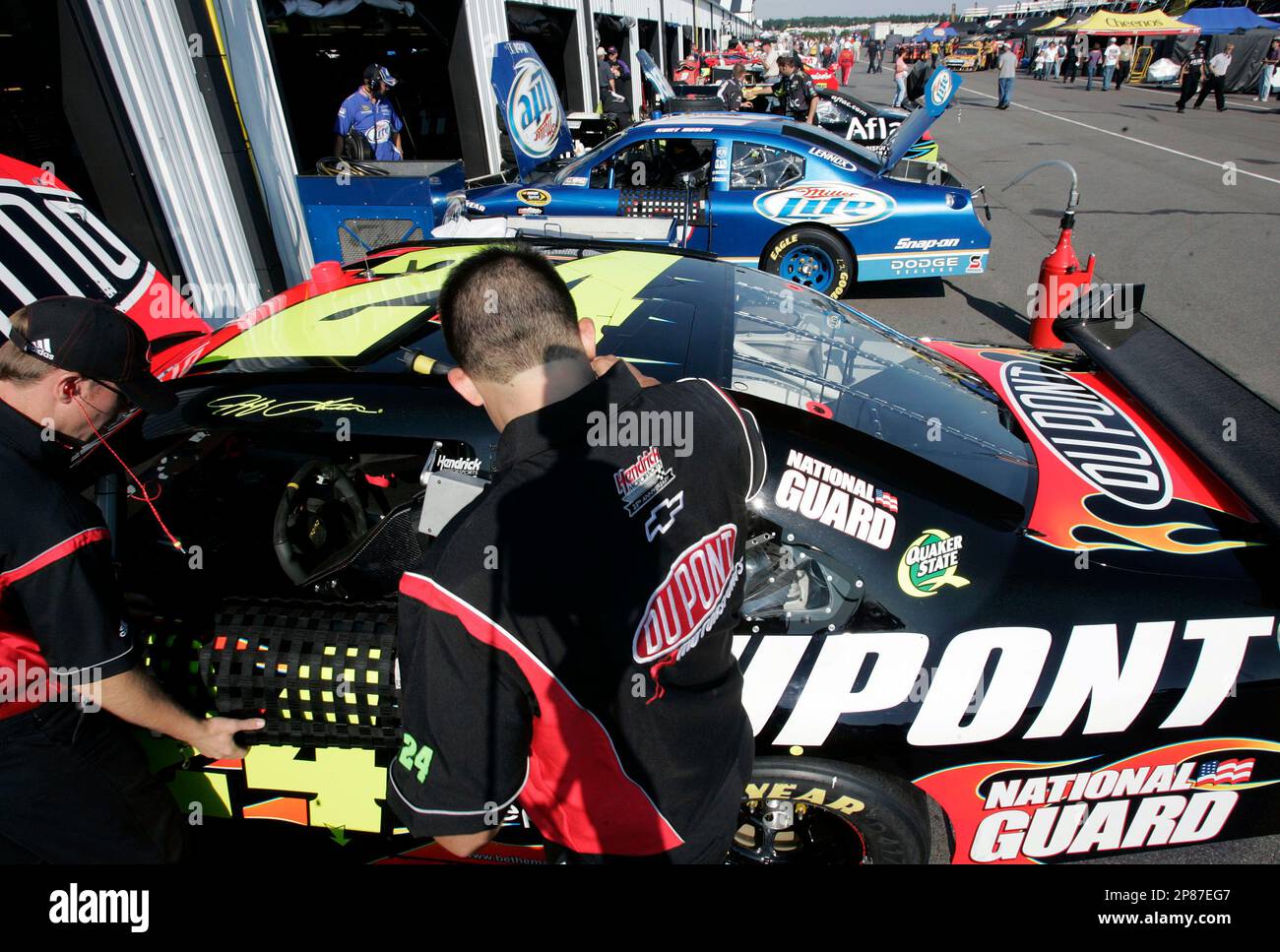 NASCAR Sprint Cup Series race car crews prepare for practice at Pocono ...