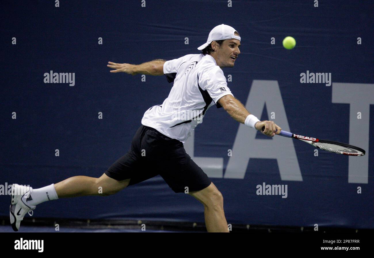 Tommy Haas, of Germany, returns to Marat Safin, of Russia, during a ...