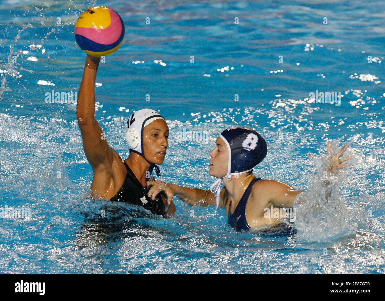 Canada's Marina Radu, left, and Jessica Steffens, of the US, challenge ...