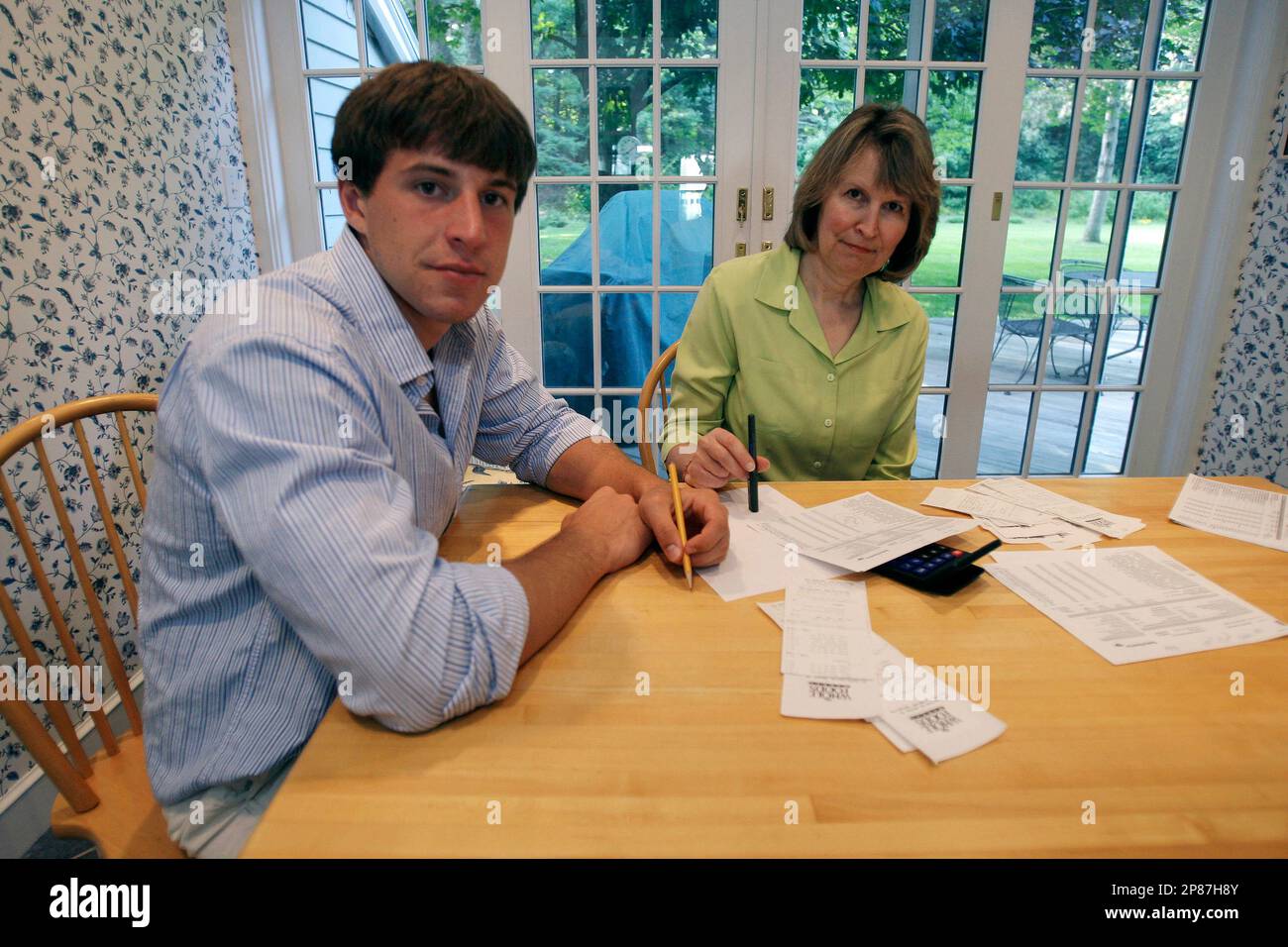 Rob Barnes and his mother Barbara Heffner pose at their home in Wayland ...