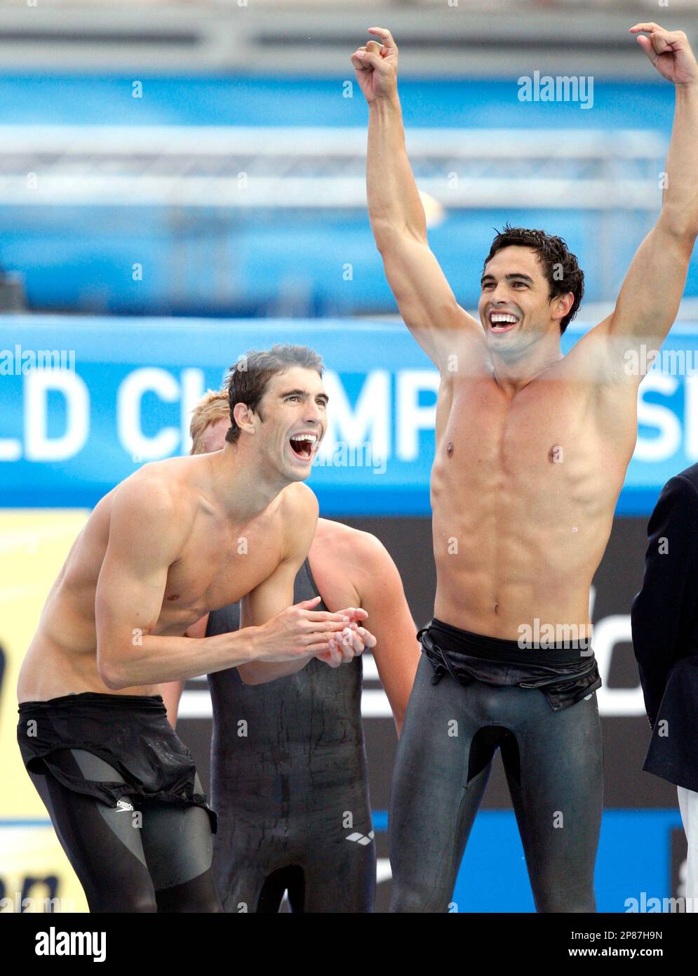 Michael Phelps, left, Ricky Berens and David Walters, background, of ...