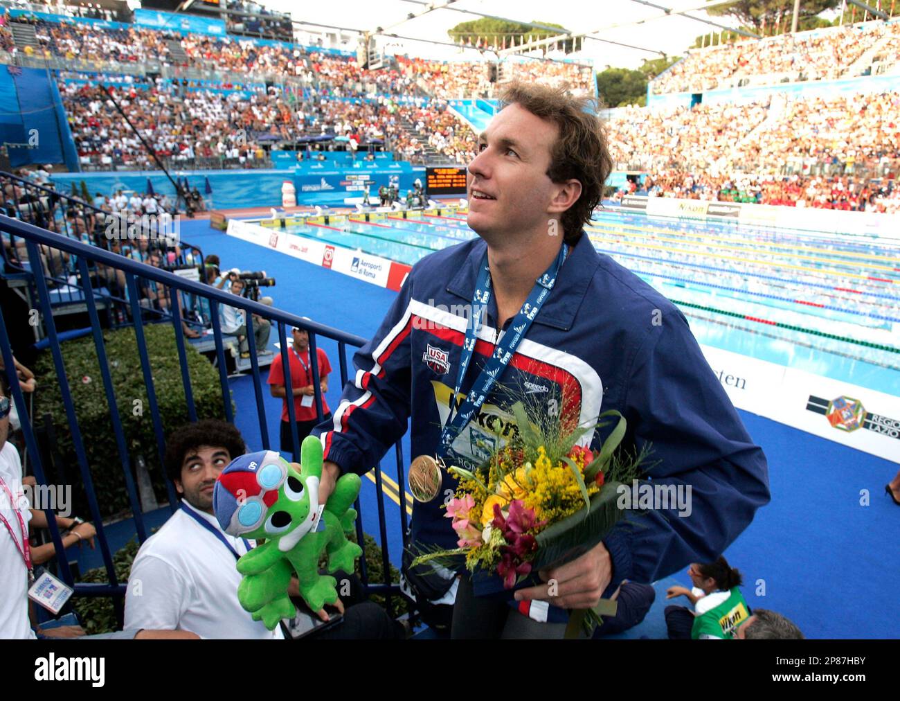 Aaron Peirsol of the United States celebrates his gold medal after ...
