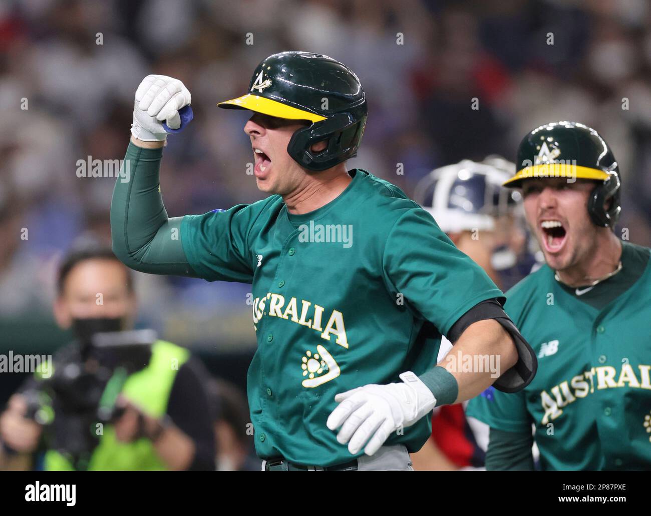 Australia's Robbie Perkins reacts after hitting a three-run homer in ...