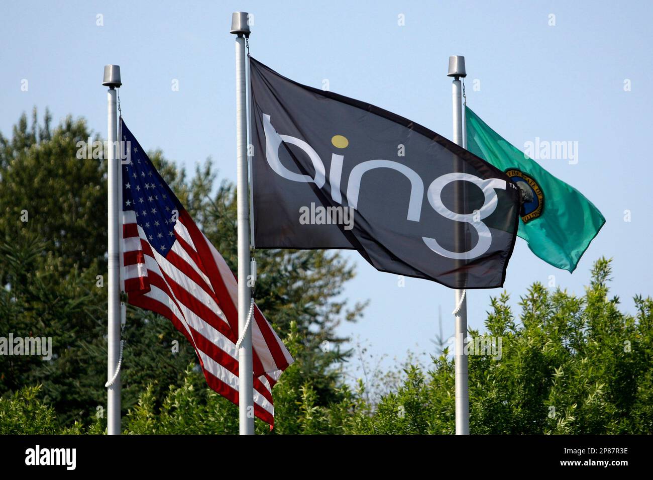 A flag for Bing flies next to American and Washington state flags on ...