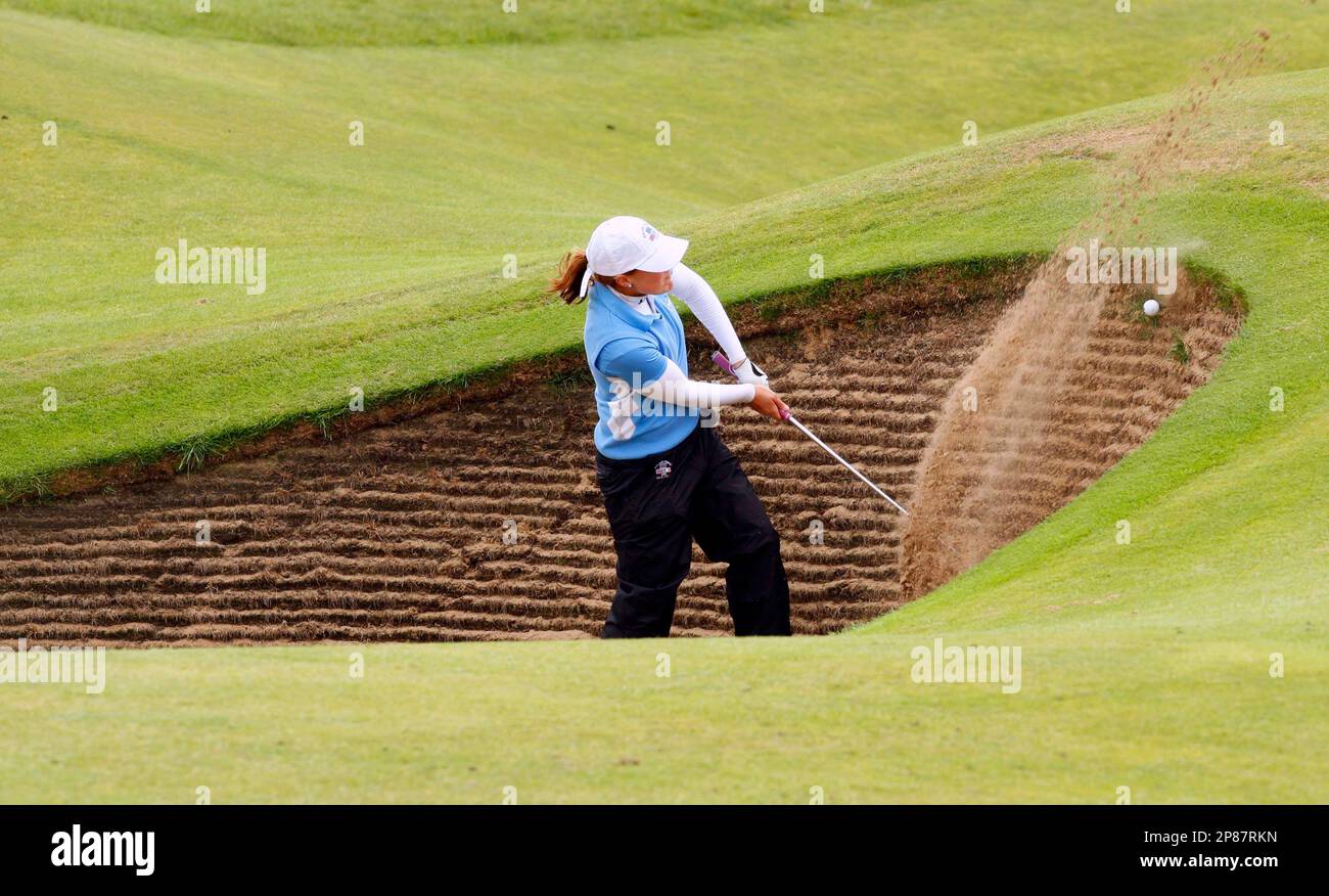 Scotland's Janice Moodie trys in vain to get out of the bunker on the ...