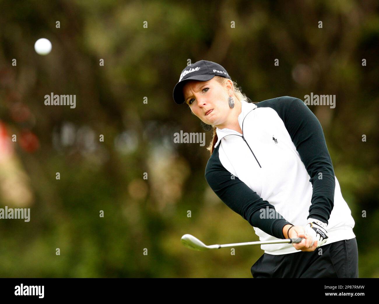 Anna Grzebien from the US chips onto the 5th green during a practice ...
