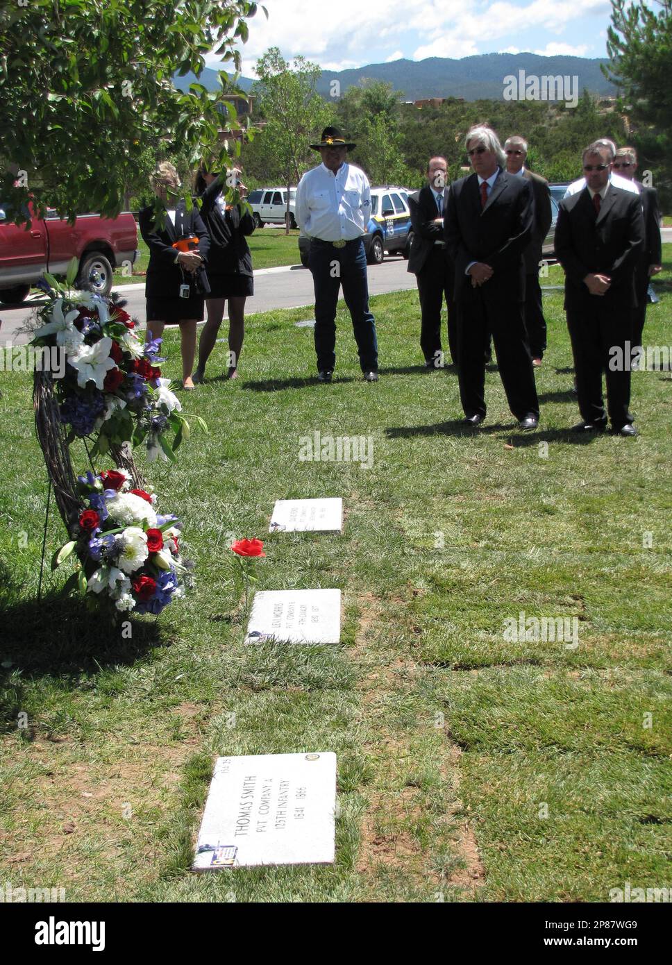 U.S. Bureau of Reclamation archaeologists Jeff Hanson, second from ...