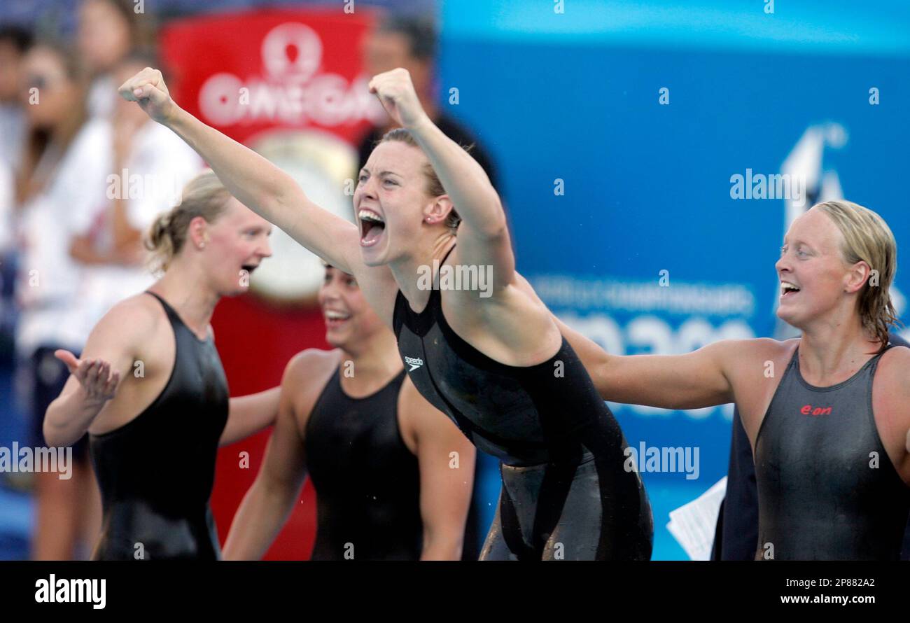 Dutch swimmer Frederike Heemskerk, center, reacts after winning the ...