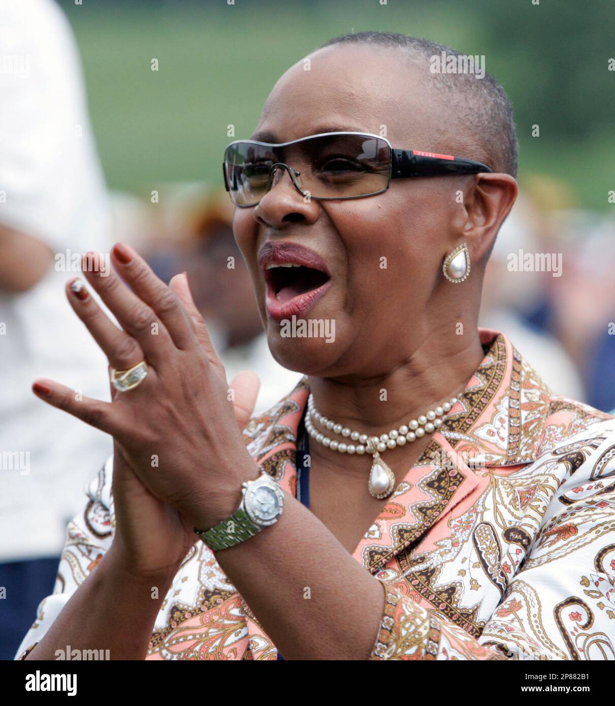 Corrine Rice applauds as her husband, Jim Rice, delivers his induction ...