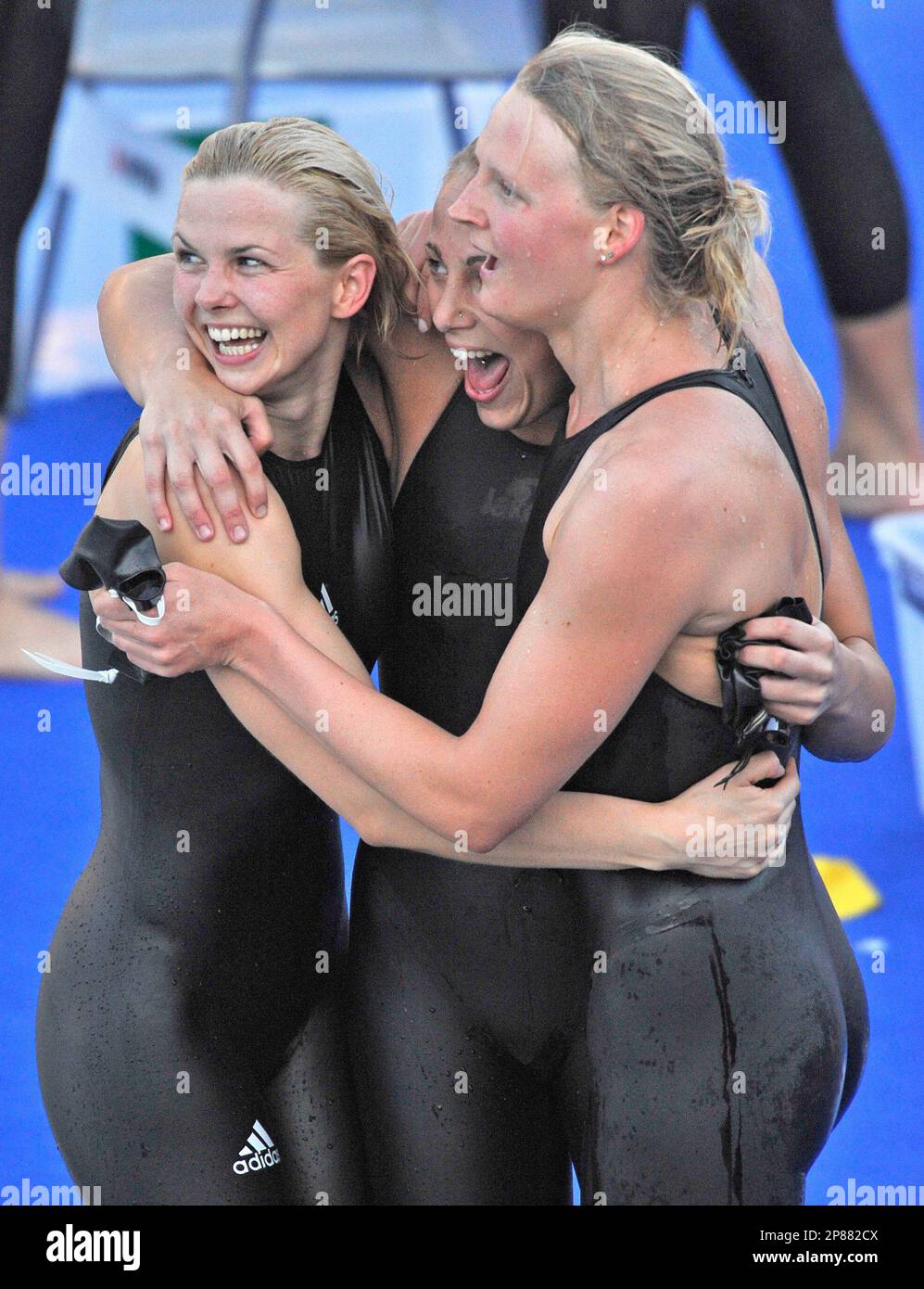 Germany's Britta Steffen, left, Daniela Samulski and Petra Dallmann ...