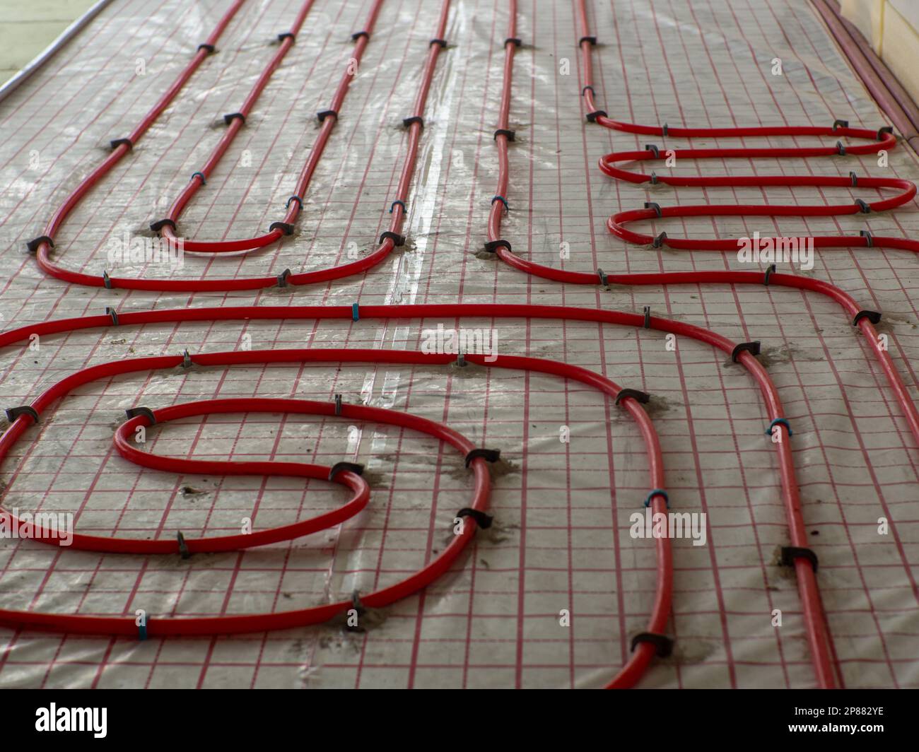 Underfloor heating installation Stock Photo - Alamy
