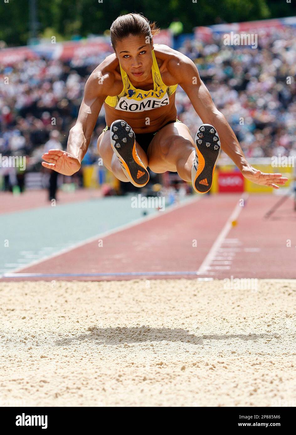Naide Gomes of Portugal competes in the women's long jump during the ...
