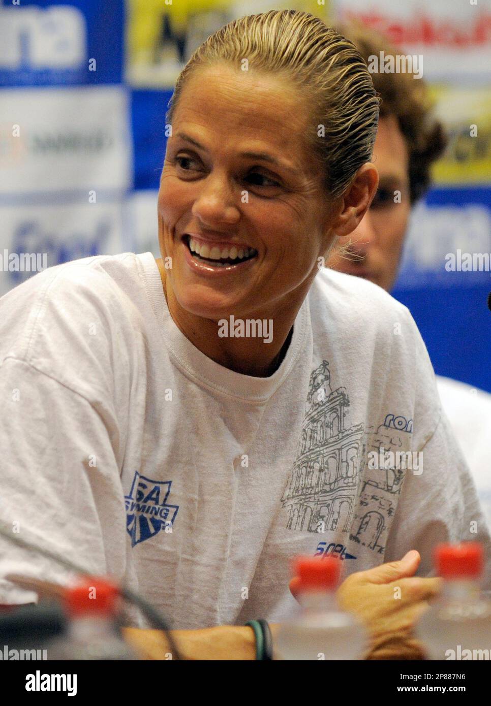 U.S. swimmer Dara Torres smiles as she attends a news conference at ...