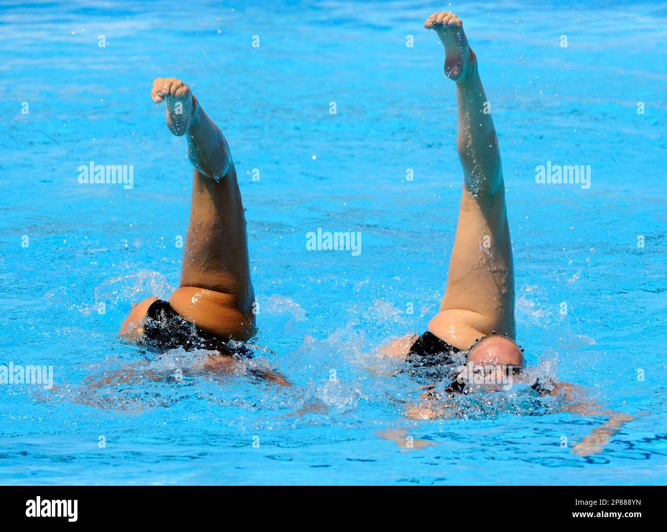 Russia's Natalia Ishchenko and Svetlana Romashina perform to win the ...