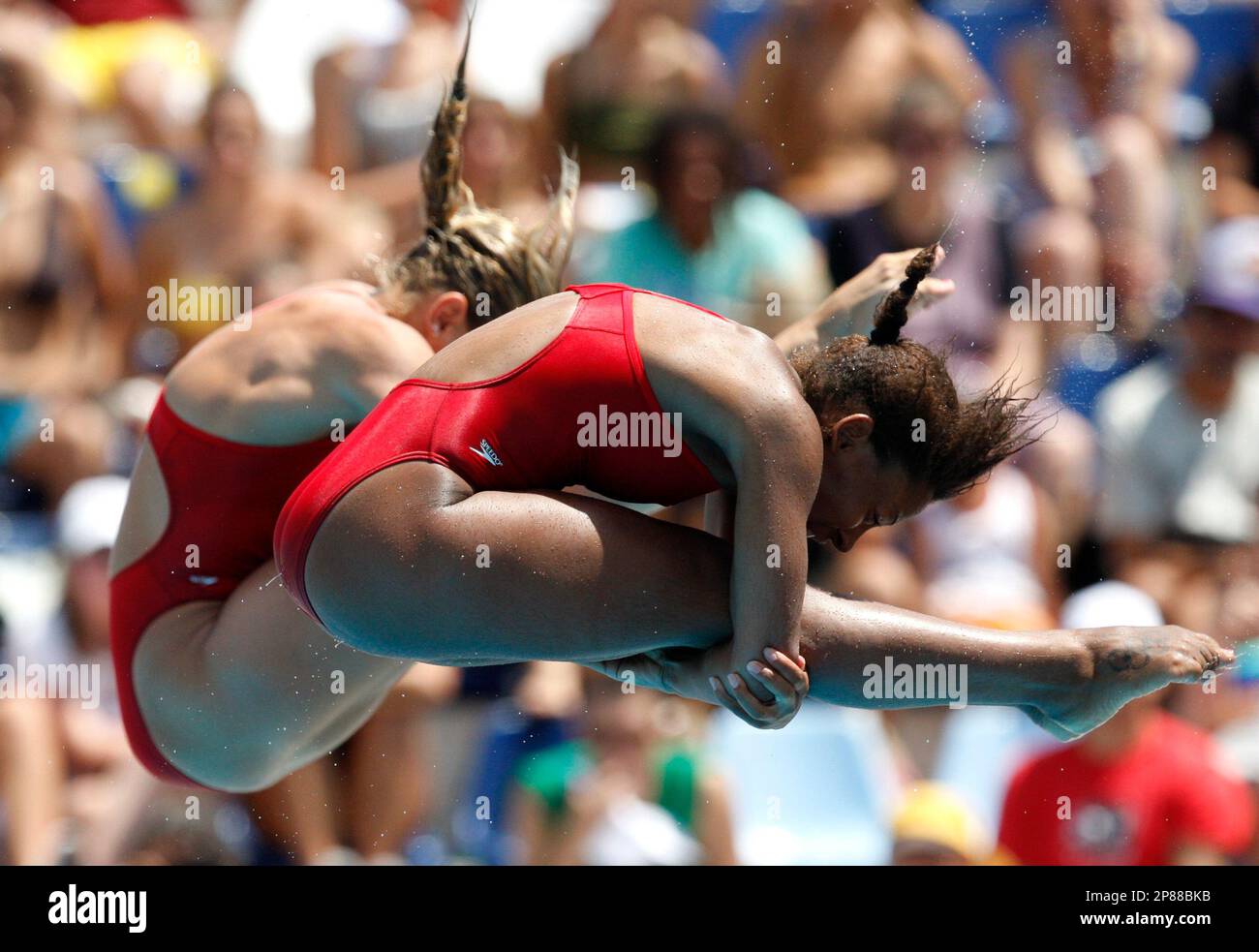 Canada's Jennifer Abel and Melanie Rinaldi perform during the women's 3 ...
