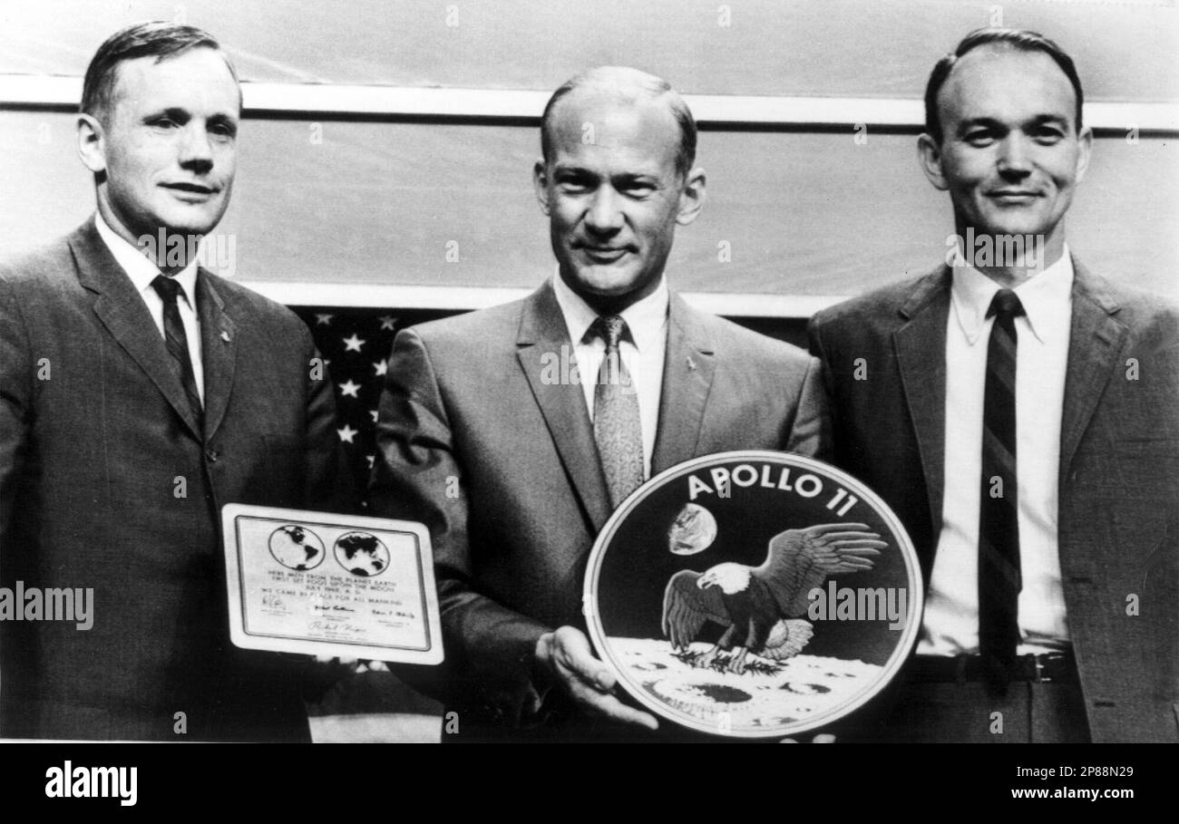 FILE - In this July 5, 1969 file photo, Astronaut Neil Armstrong, left ...