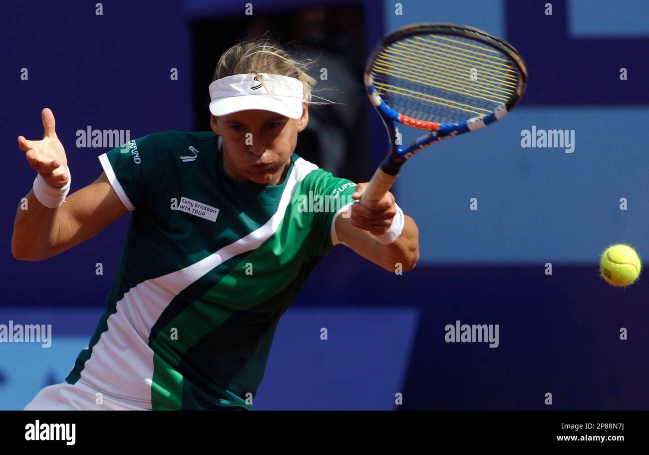 Sybille Bammer from Austria returns a ball to Italy's Francesca ...