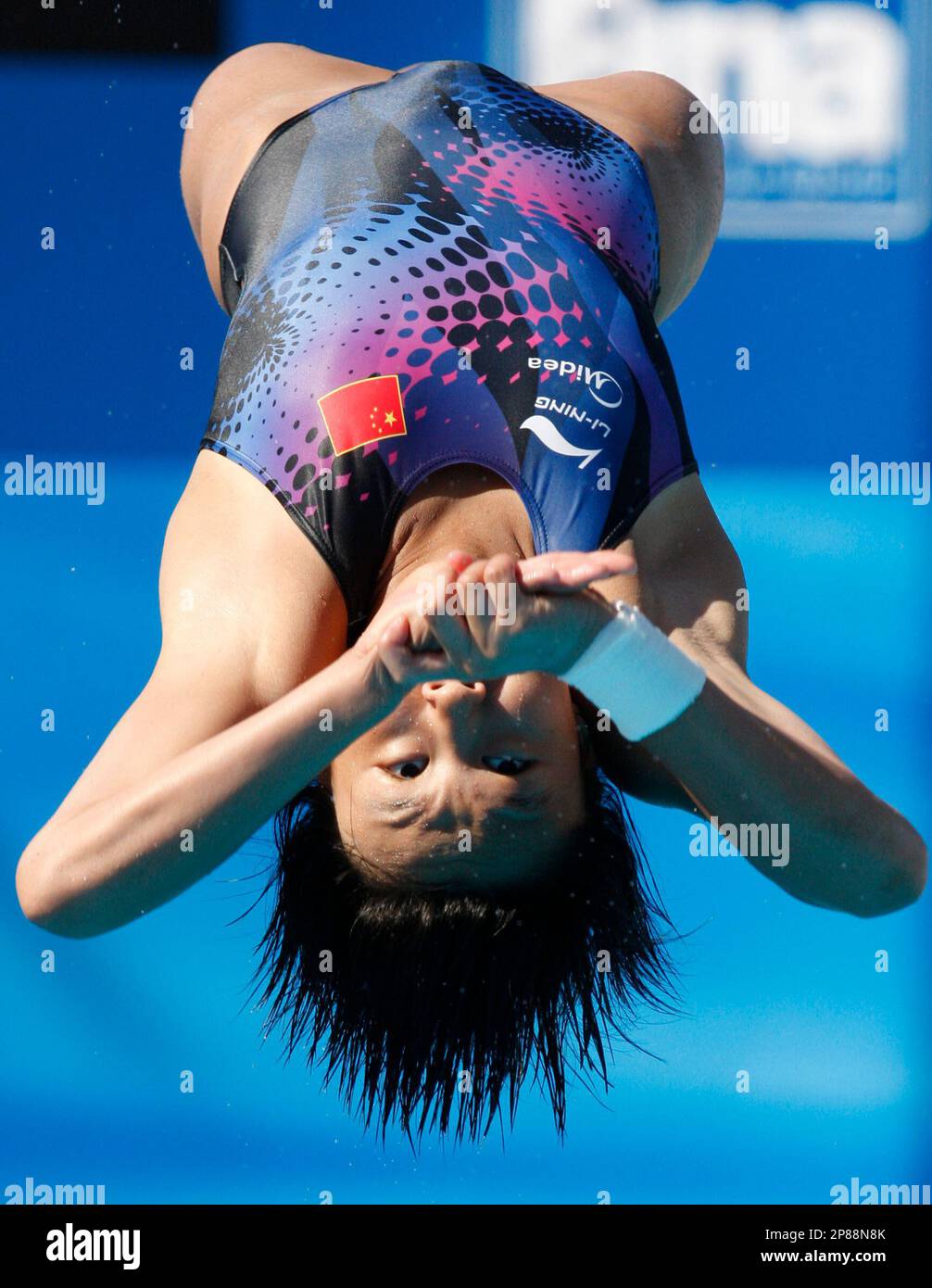 China's Wang Han performs on her way to clinch the bronze medal of the ...
