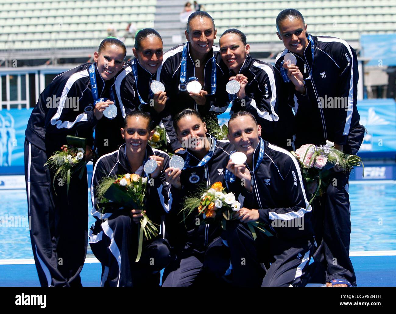 The Spanish team show their silver medals of the team technical final ...