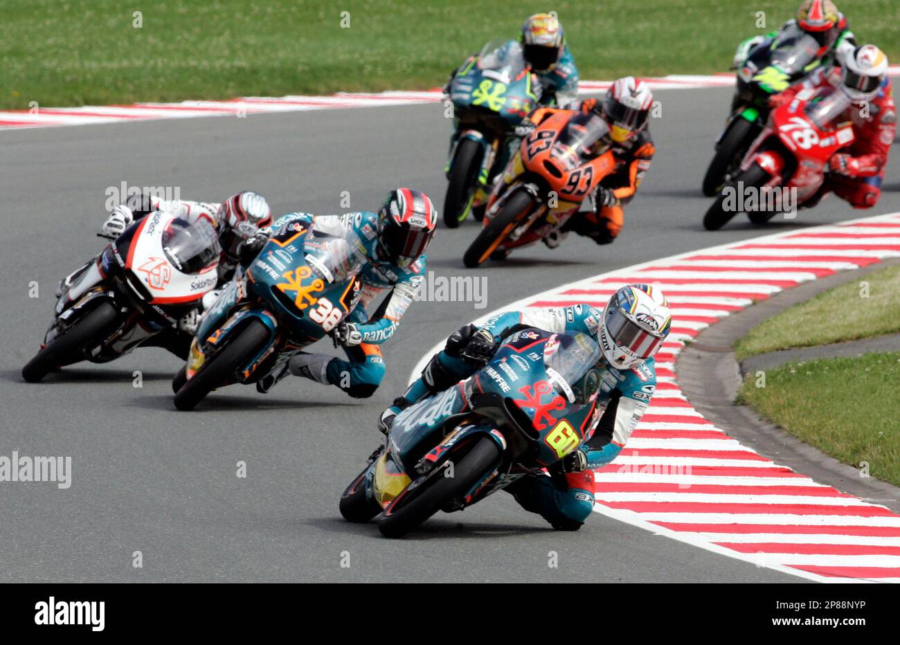 Spain's rider Julian Simon leads the queue after the start of the 125cc ...
