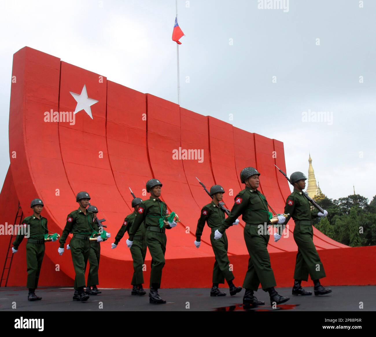 A military honor guard marches at Myanmar's Martyr's memorial during ...