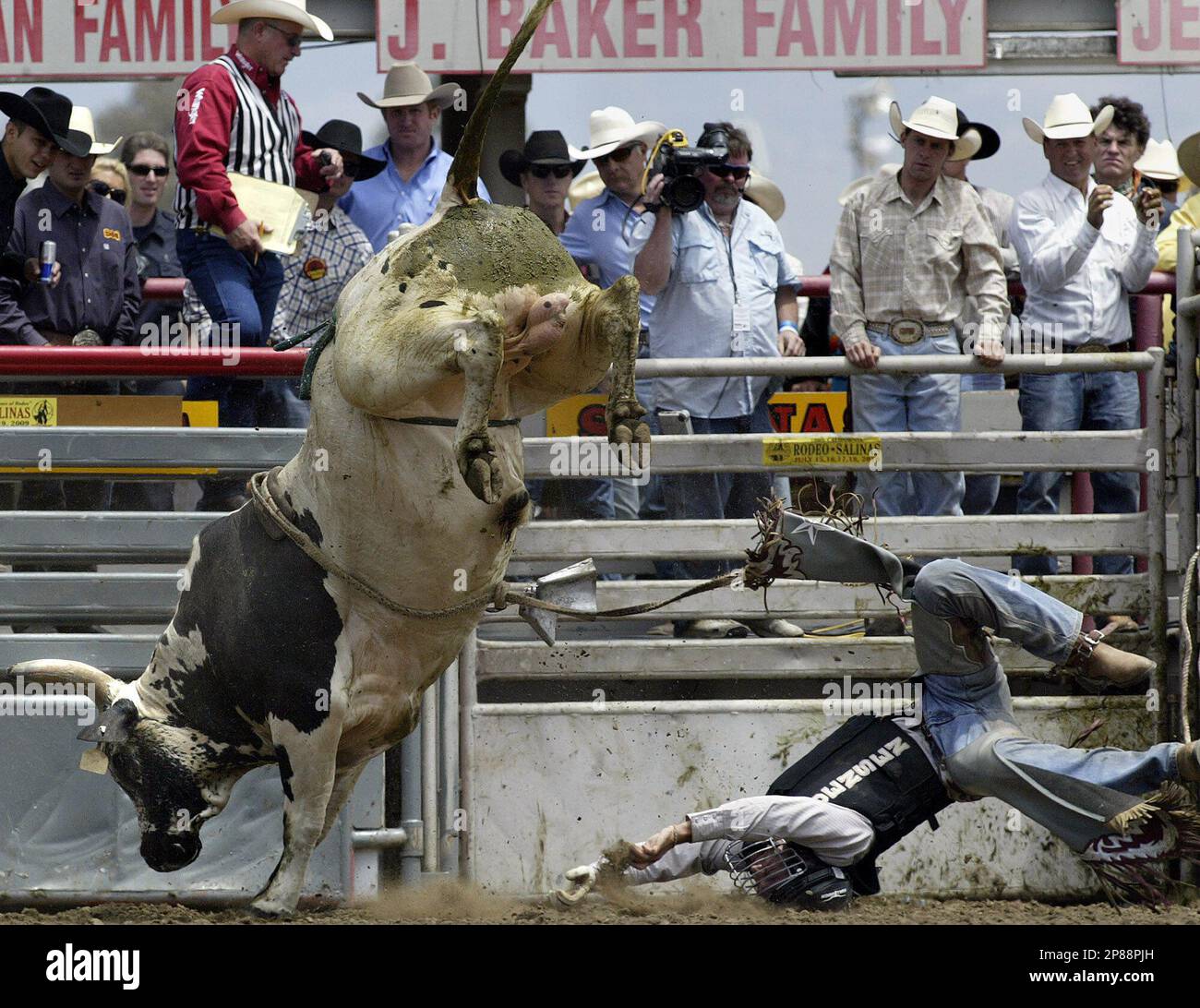 Bull rider Nick Jensen, from Chico, Calif., gets tossed by Hank The ...