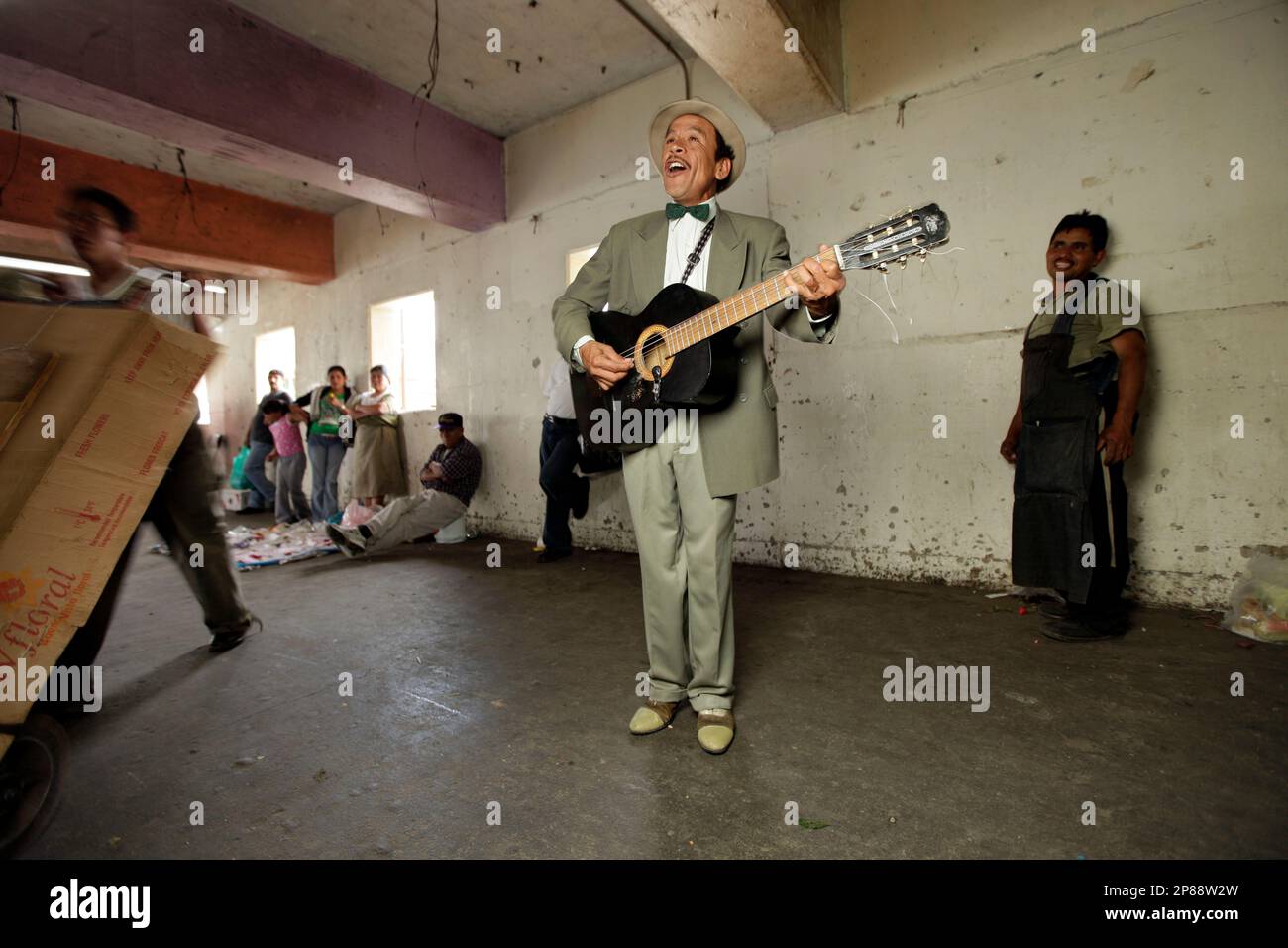 Basilon Quasquas sings for spare change dressed as Mexican icon Tin Tan ...