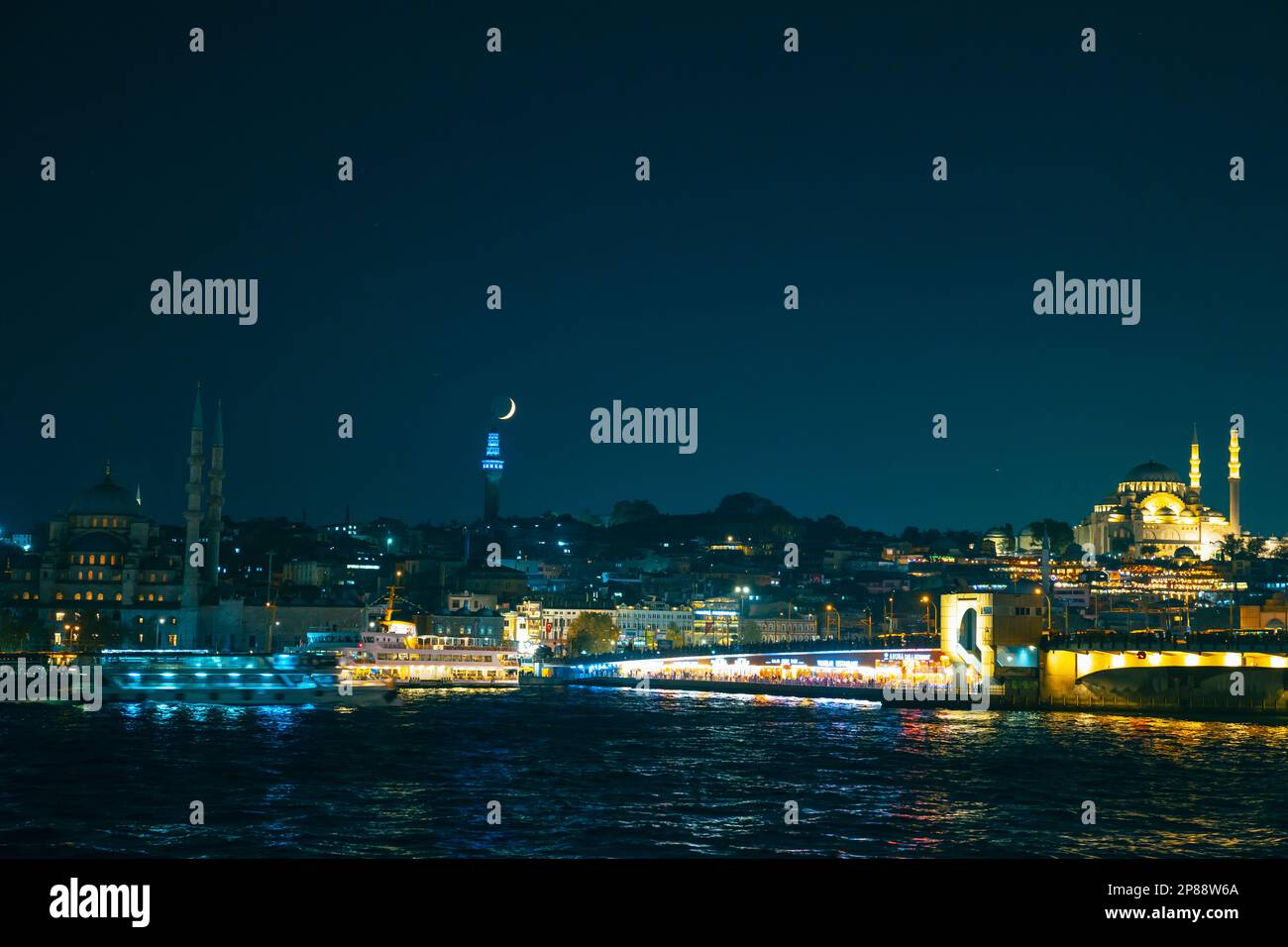 Istanbul view with Galata Bridge and Suleymaniye Mosque and crescent ...