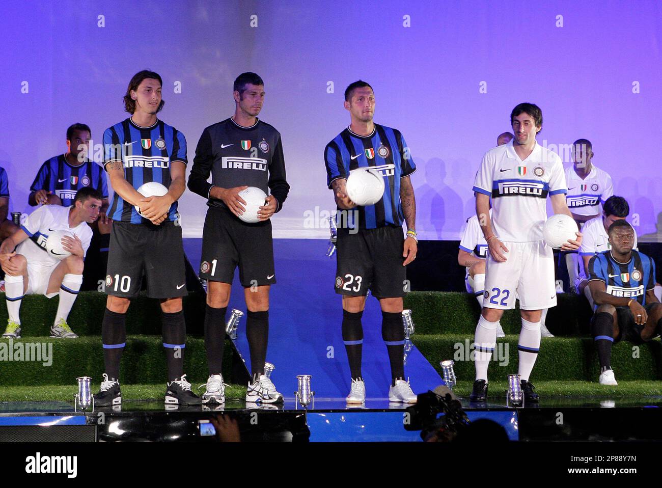 Members of Italy's Inter Milan soccer team wear new uniforms during a ...
